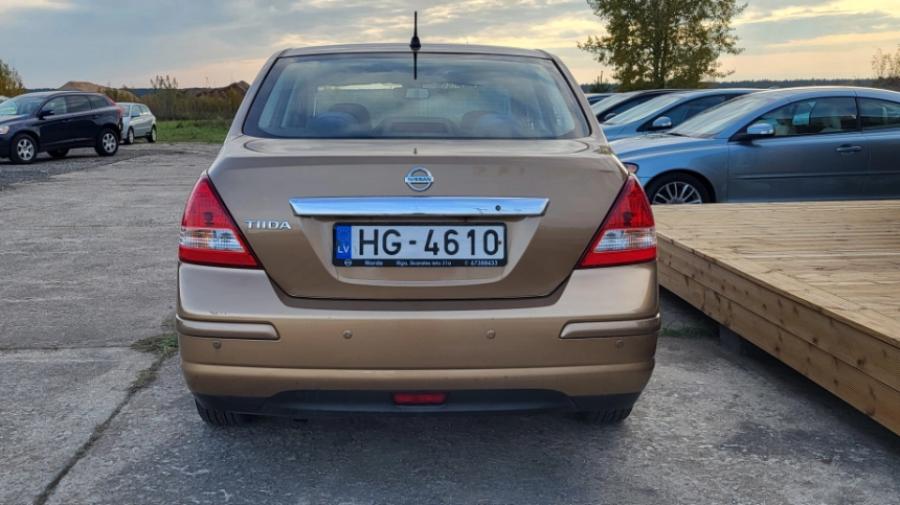 Brown Nissan TIIDA 2008 in Riga, with an engine capacity of 1.60 L and mileage of 156 thousand km for 2750 €, photo 16 on AUTOMOTO.COM.LV