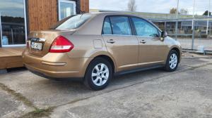 Brown Nissan TIIDA 2008 in Riga, with an engine capacity of 1.60 L and mileage of 156 thousand km for 2750 €, photo 18 on AUTOMOTO.COM.LV