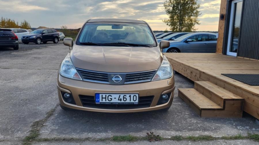 Brown Nissan TIIDA 2008 in Riga, with an engine capacity of 1.60 L and mileage of 156 thousand km for 2750 €, photo 19 on AUTOMOTO.COM.LV