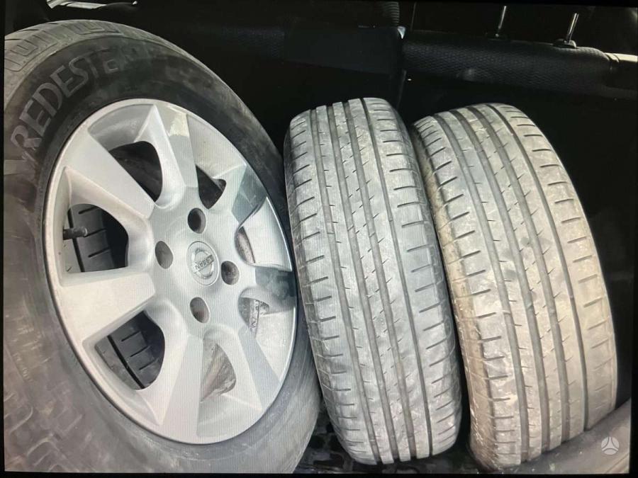 Grey Nissan TIIDA 2008 in Prienai, with an engine capacity of 1.80 L and mileage of 171 thousand km for 1999 €, photo 15 on AUTOMOTO.COM.LV