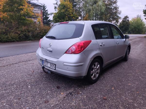 Nissan TIIDA 2008 in Anyksciai on AUTOMOTO.COM.LV Grey Nissan TIIDA 2008 in Anyksciai, with an engine capacity of 1.50 L and mileage of 276 thousand km for 900 €, photo 6 on AUTOMOTO.COM.LV