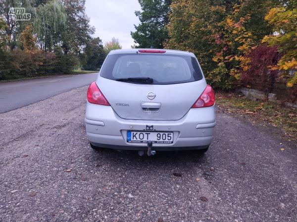 Nissan TIIDA 2008 in Anyksciai on AUTOMOTO.COM.LV Grey Nissan TIIDA 2008 in Anyksciai, with an engine capacity of 1.50 L and mileage of 276 thousand km for 900 €, photo 7 on AUTOMOTO.COM.LV
