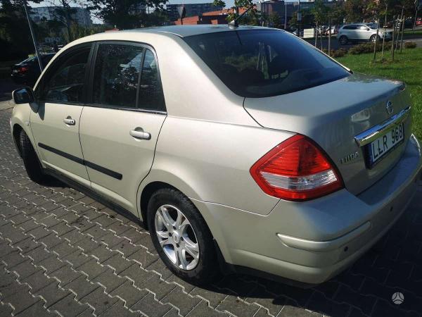 Yellow Nissan TIIDA 2009 in Vilnius, with an engine capacity of 1.60 L and mileage of 147 thousand km for 3883 €, photo 1 on AUTOMOTO.COM.LV