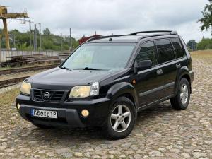 Melns Nissan X-Trail 2002 Viļņa, ar dzinēja tilpumu 2.18 L un nobraukumu 273 tūkst. km par 1650 €, foto  vietnē AUTOMOTO.COM.LV