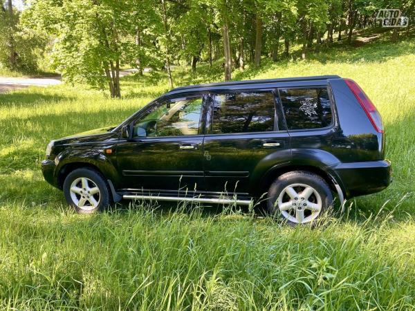 Melns Nissan X-Trail 2002 Viļņa, ar dzinēja tilpumu 2.20 L un nobraukumu 357 tūkst. km par 1500 €, foto 5 vietnē AUTOMOTO.COM.LV