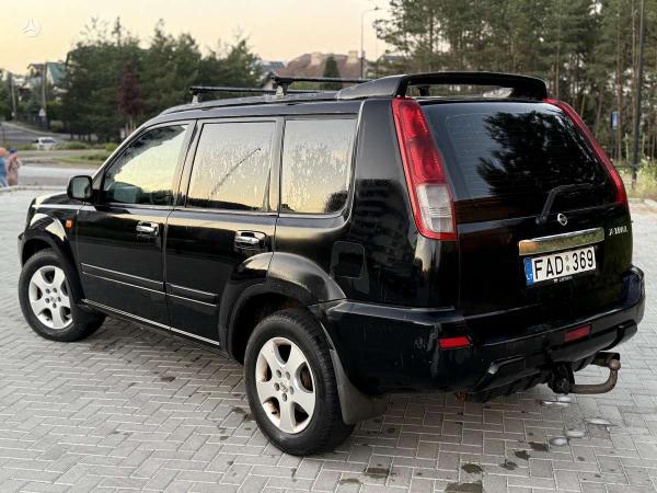 Black Nissan X-Trail 2003 in Vilnius, with an engine capacity of 0.00 L and mileage of 310 thousand km for 1700 €, photo 5 on AUTOMOTO.COM.LV
