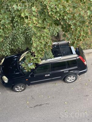 Melns Nissan X-Trail 2003 Daugavpils, ar dzinēja tilpumu 2.20 L un nobraukumu 199 tūkst. km par 1500 €, foto 4 vietnē AUTOMOTO.COM.LV
