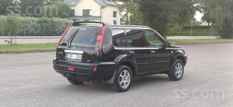 Black Nissan X-Trail 2004 in Riga, with an engine capacity of 2.20 L and mileage of 246 thousand km for 2000 €, photo 6 on AUTOMOTO.COM.LV