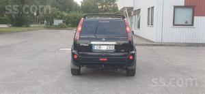 Black Nissan X-Trail 2004 in Riga, with an engine capacity of 2.20 L and mileage of 246 thousand km for 2000 €, photo 7 on AUTOMOTO.COM.LV