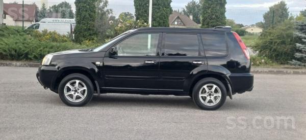 Black Nissan X-Trail 2004 in Riga, with an engine capacity of 2.20 L and mileage of 246 thousand km for 2000 €, photo 8 on AUTOMOTO.COM.LV