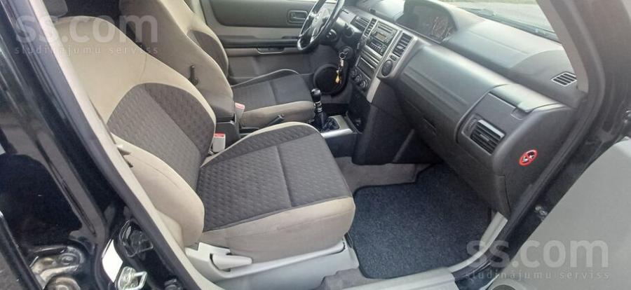 Black Nissan X-Trail 2004 in Riga, with an engine capacity of 2.20 L and mileage of 246 thousand km for 2000 €, photo 13 on AUTOMOTO.COM.LV