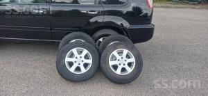 Black Nissan X-Trail 2004 in Riga, with an engine capacity of 2.20 L and mileage of 246 thousand km for 2000 €, photo 21 on AUTOMOTO.COM.LV