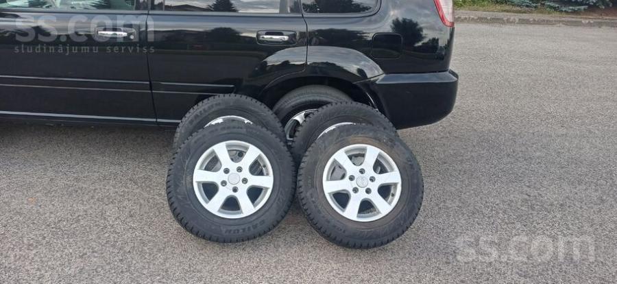 Black Nissan X-Trail 2004 in Riga, with an engine capacity of 2.20 L and mileage of 246 thousand km for 2000 €, photo 21 on AUTOMOTO.COM.LV