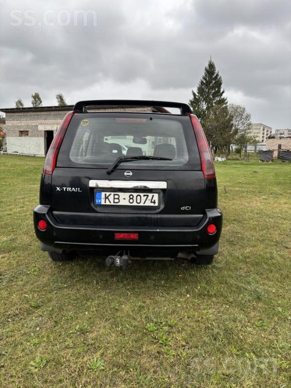 Nissan X-Trail 2004 in Riga on AUTOMOTO.COM.LV Black Nissan X-Trail 2004 in Riga, with an engine capacity of 2.20 L and mileage of 280 thousand km for 2000 €, photo 6 on AUTOMOTO.COM.LV