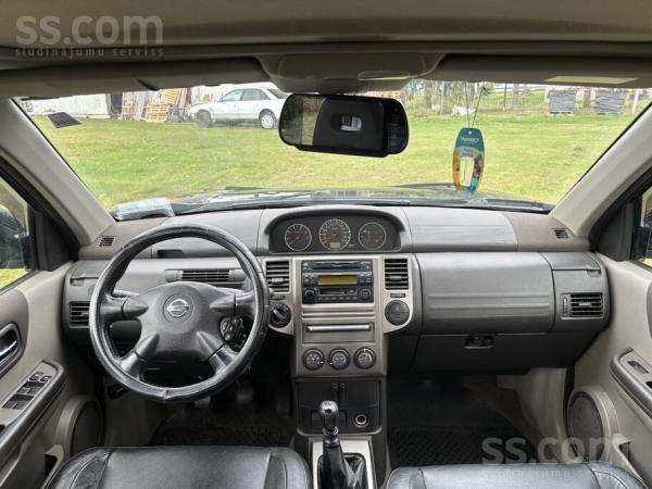 Nissan X-Trail 2004 in Riga on AUTOMOTO.COM.LV Black Nissan X-Trail 2004 in Riga, with an engine capacity of 2.20 L and mileage of 280 thousand km for 2000 €, photo 8 on AUTOMOTO.COM.LV