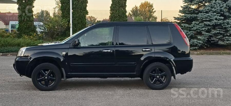 Black Nissan X-Trail 2004 in Riga, with an engine capacity of 2.20 L and mileage of 263 thousand km for 2600 €, photo 6 on AUTOMOTO.COM.LV