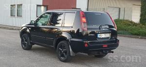 Black Nissan X-Trail 2004 in Riga, with an engine capacity of 2.20 L and mileage of 263 thousand km for 2600 €, photo 7 on AUTOMOTO.COM.LV