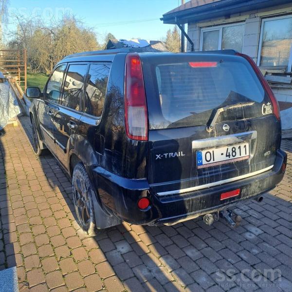 Black Nissan X-Trail 2005 in Jelgava, with an engine capacity of 2.20 L and mileage of 253 thousand km for 900 €, photo 2 on AUTOMOTO.COM.LV