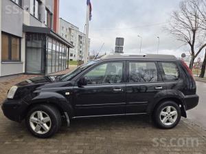 Black Nissan X-Trail 2005 in Bauska, with an engine capacity of 2.20 L and mileage of 263 thousand km for 1900 €, photo 2 on AUTOMOTO.COM.LV