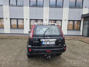 Black Nissan X-Trail 2005 in Bauska, with an engine capacity of 2.20 L and mileage of 263 thousand km for 1900 €, photo 4 on AUTOMOTO.COM.LV
