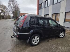 Black Nissan X-Trail 2005 in Bauska, with an engine capacity of 2.20 L and mileage of 263 thousand km for 1900 €, photo 5 on AUTOMOTO.COM.LV