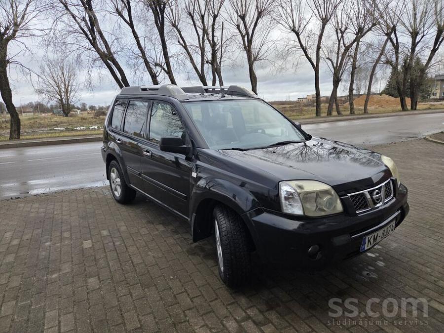 Black Nissan X-Trail 2005 in Bauska, with an engine capacity of 2.20 L and mileage of 263 thousand km for 1900 €, photo 6 on AUTOMOTO.COM.LV