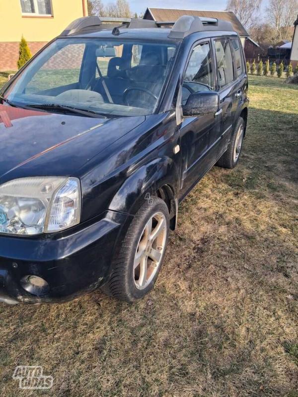Melns Nissan X-Trail 2005 Pagėgiai, ar dzinēja tilpumu 2.20 L un nobraukumu 170 tūkst. km par 3500 €, foto 3 vietnē AUTOMOTO.COM.LV