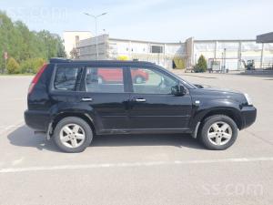 Black Nissan X-Trail 2005 in Riga, with an engine capacity of 2.20 L and mileage of 273 thousand km for 4500 €, photo 5 on AUTOMOTO.COM.LV