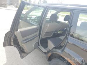 Black Nissan X-Trail 2005 in Riga, with an engine capacity of 2.20 L and mileage of 273 thousand km for 4500 €, photo 18 on AUTOMOTO.COM.LV