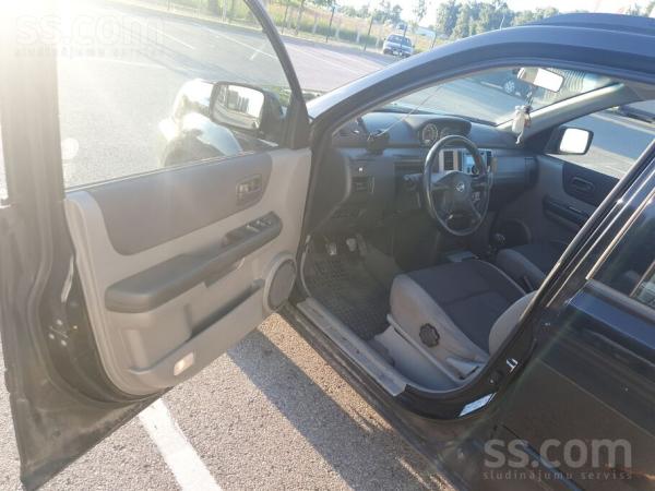 Melns Nissan X-Trail 2005 Rīga, ar dzinēja tilpumu 2.20 L un nobraukumu 276 tūkst. km par 3900 €, foto 6 vietnē AUTOMOTO.COM.LV