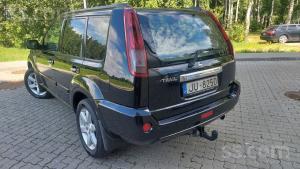 Black Nissan X-Trail 2005 in Riga, with an engine capacity of 2.20 L and mileage of 243 thousand km for 3500 €, photo 7 on AUTOMOTO.COM.LV