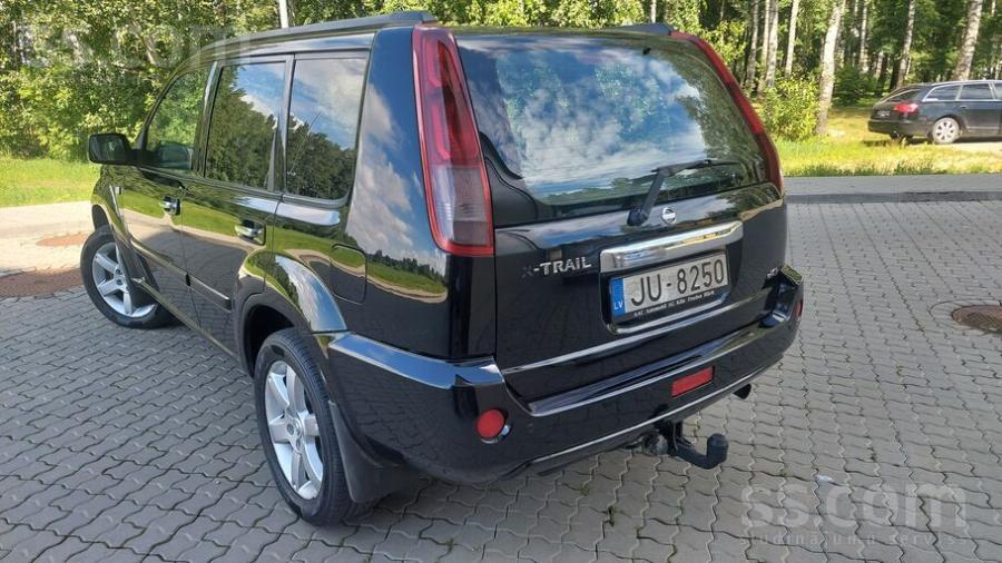 Black Nissan X-Trail 2005 in Riga, with an engine capacity of 2.20 L and mileage of 243 thousand km for 3500 €, photo 7 on AUTOMOTO.COM.LV