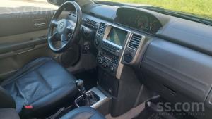 Black Nissan X-Trail 2005 in Riga, with an engine capacity of 2.20 L and mileage of 243 thousand km for 3500 €, photo 12 on AUTOMOTO.COM.LV