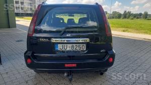 Black Nissan X-Trail 2005 in Riga, with an engine capacity of 2.20 L and mileage of 243 thousand km for 3500 €, photo 15 on AUTOMOTO.COM.LV