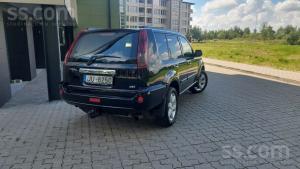 Black Nissan X-Trail 2005 in Riga, with an engine capacity of 2.20 L and mileage of 243 thousand km for 3500 €, photo 22 on AUTOMOTO.COM.LV