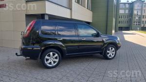 Black Nissan X-Trail 2005 in Riga, with an engine capacity of 2.20 L and mileage of 243 thousand km for 3500 €, photo 26 on AUTOMOTO.COM.LV