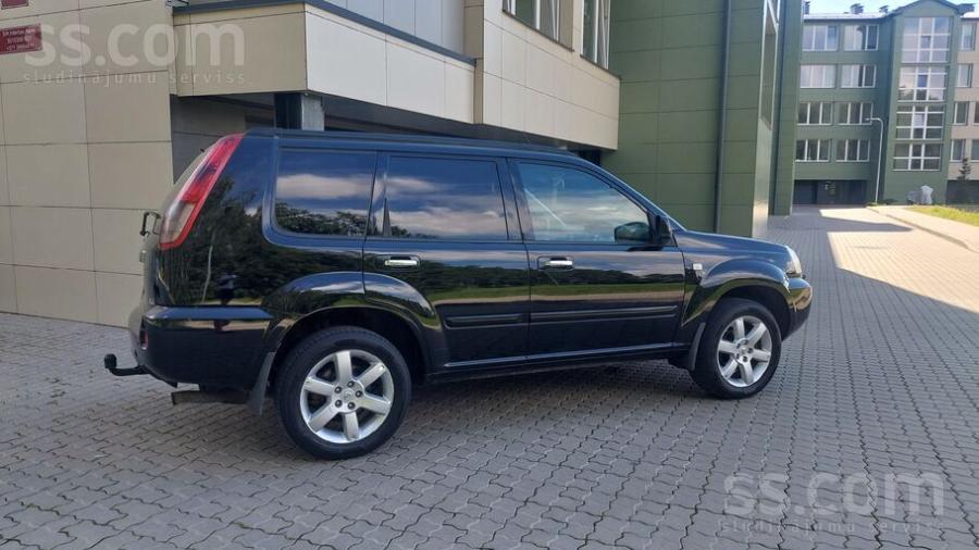 Black Nissan X-Trail 2005 in Riga, with an engine capacity of 2.20 L and mileage of 243 thousand km for 3500 €, photo 26 on AUTOMOTO.COM.LV