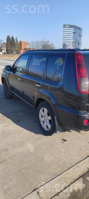 Black Nissan X-Trail 2005 in Riga, with an engine capacity of 2.20 L and mileage of 317 thousand km for 3800 €, photo 5 on AUTOMOTO.COM.LV