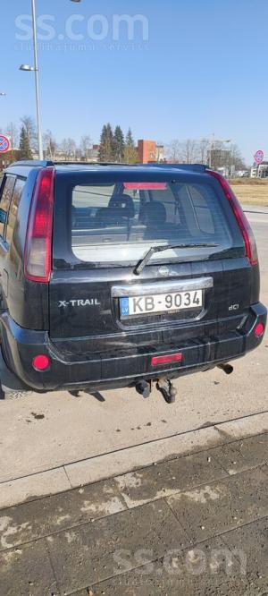 Black Nissan X-Trail 2005 in Riga, with an engine capacity of 2.20 L and mileage of 317 thousand km for 3800 €, photo 6 on AUTOMOTO.COM.LV