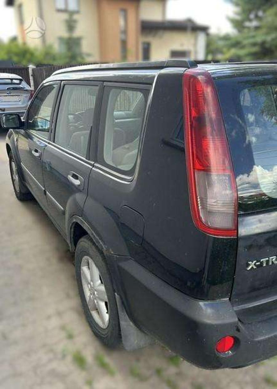 Black Nissan X-Trail 2005 in Vilnius, with an engine capacity of 2.18 L and mileage of 239 thousand km for 1300 €, photo 7 on AUTOMOTO.COM.LV