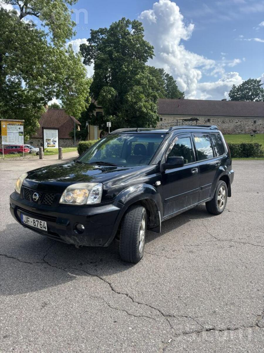 Melns Nissan X-Trail 2005 Tukums, ar dzinēja tilpumu 2.20 L un nobraukumu 378 tūkst. km par 1400 €, foto 1 vietnē AUTOMOTO.COM.LV