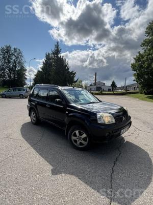 Melns Nissan X-Trail 2005 Tukums, ar dzinēja tilpumu 2.20 L un nobraukumu 378 tūkst. km par 1400 €, foto 3 vietnē AUTOMOTO.COM.LV