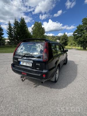 Melns Nissan X-Trail 2005 Tukums, ar dzinēja tilpumu 2.20 L un nobraukumu 378 tūkst. km par 1400 €, foto 4 vietnē AUTOMOTO.COM.LV