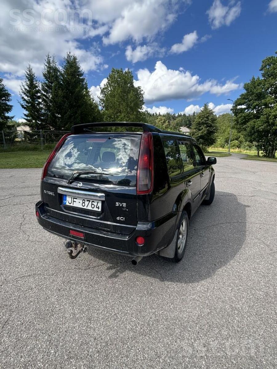 Melns Nissan X-Trail 2005 Tukums, ar dzinēja tilpumu 2.20 L un nobraukumu 378 tūkst. km par 1400 €, foto 4 vietnē AUTOMOTO.COM.LV