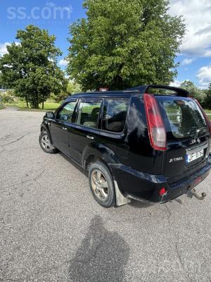 Melns Nissan X-Trail 2005 Tukums, ar dzinēja tilpumu 2.20 L un nobraukumu 378 tūkst. km par 1400 €, foto 5 vietnē AUTOMOTO.COM.LV