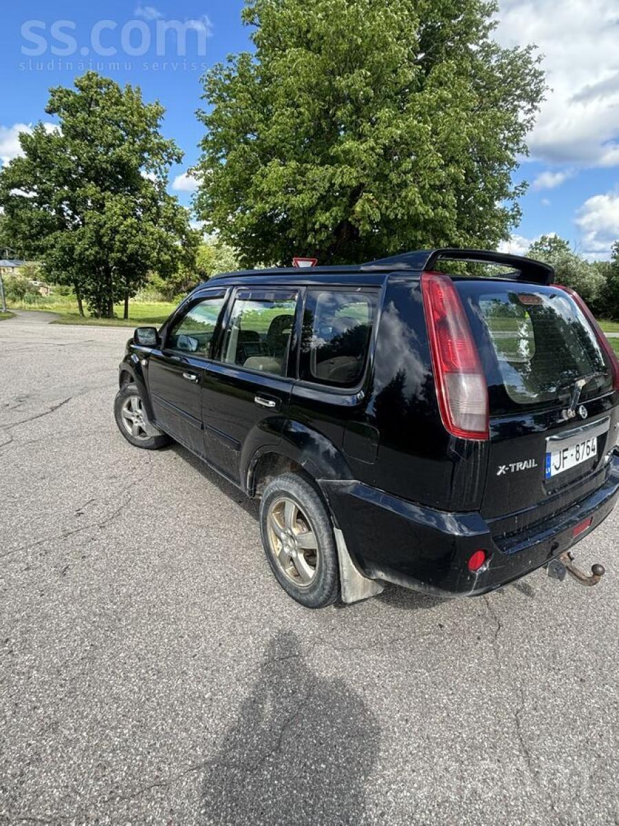 Melns Nissan X-Trail 2005 Tukums, ar dzinēja tilpumu 2.20 L un nobraukumu 378 tūkst. km par 1400 €, foto 5 vietnē AUTOMOTO.COM.LV