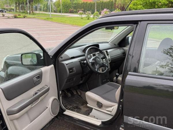 Melns Nissan X-Trail 2005 Rīga, ar dzinēja tilpumu 2.20 L un nobraukumu 273 tūkst. km par 2550 €, foto 5 vietnē AUTOMOTO.COM.LV