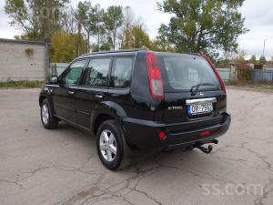 Черный Ниссан ИксТрейл 2005 в Рига, объемом двигателя 2.20 л и пробегом 297 тыс. км за 2650 €, фото 30 на AUTOMOTO.COM.LV