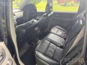 Black Nissan X-Trail 2006 in Riga, with an engine capacity of 2.20 L and mileage of 294 thousand km for 1650 €, photo 5 on AUTOMOTO.COM.LV