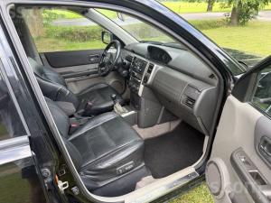 Black Nissan X-Trail 2006 in Riga, with an engine capacity of 2.20 L and mileage of 294 thousand km for 1650 €, photo 6 on AUTOMOTO.COM.LV
